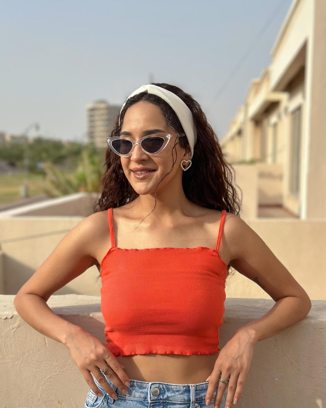 Anoushay Abbasi Shines In Orange For Her Summer Look | Reviewit.pk
